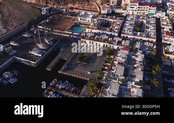 Aerial 4K pan shows Puerto de Mogan, Gran Canaria. Marina, Little ...