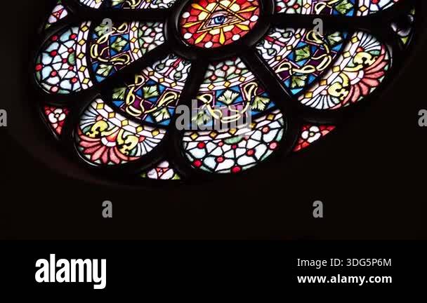 A decorative church window in Germany featuring the Christian Trinity ...