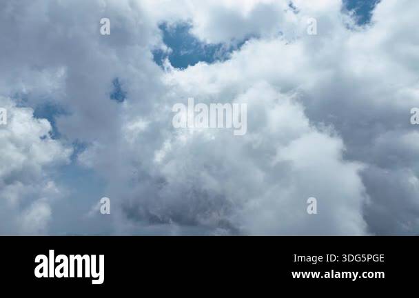 Infinite sea of fluffy white clouds stretches to the horizon under ...