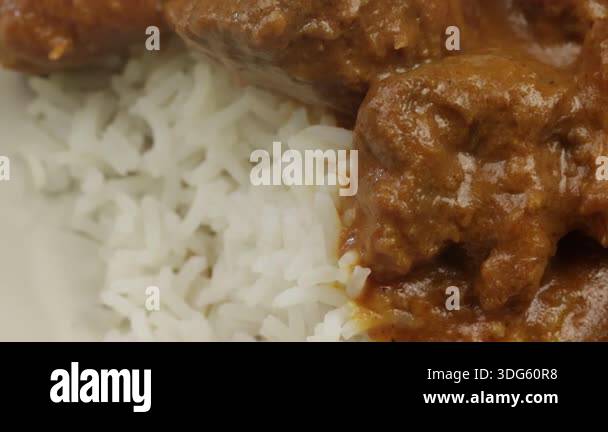 Beef goulash served with white rice Stock Video Footage - Alamy