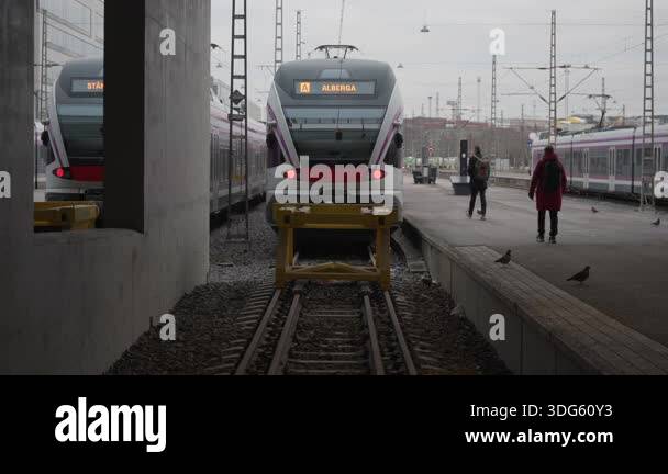 Front view of commuter train at Helsinki Central Station platform with ...
