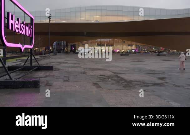 Large Helsinki pink neon sign stands at Kansalaistori square with ...
