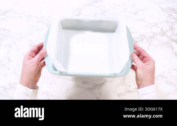 Castle Rock, CO, USA-019 - January 18, 2025 - Hands hold a blue ceramic ...