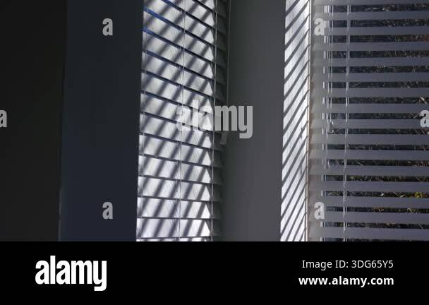 Venetian blinds window slats string in sunlight shadows medium zoom ...