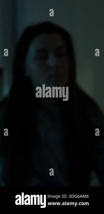A young woman experiences dizziness and mental confusion at night ...