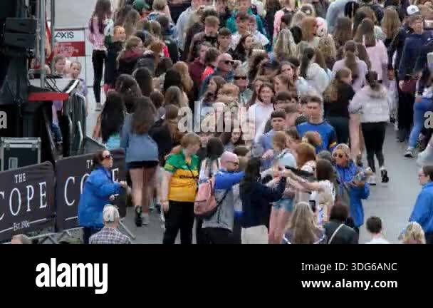 DUNGLOE, COUNTY DONEGAL, IRELAND - JULY 31 2025 : Locals and visitors ...