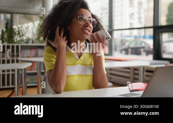 Emotional African American student girl woman record audio message ...