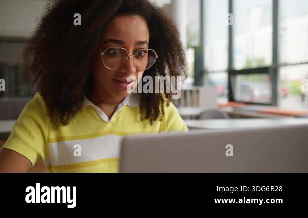 Amazed emotional African American woman excited wonder university ...