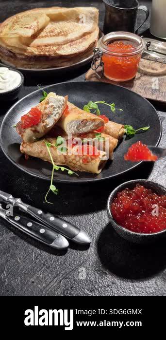 Traditional blini with cream cheese and red caviar.Maslenitsa Stock ...
