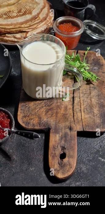 Traditional blini with cream cheese and red caviar.Maslenitsa Stock ...