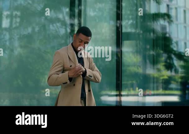 Cool rich African American business man walk city outdoors office ...