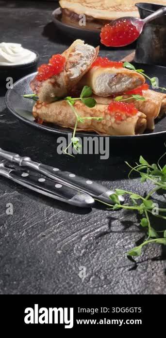 Traditional blini with cream cheese and red caviar.Maslenitsa Stock ...