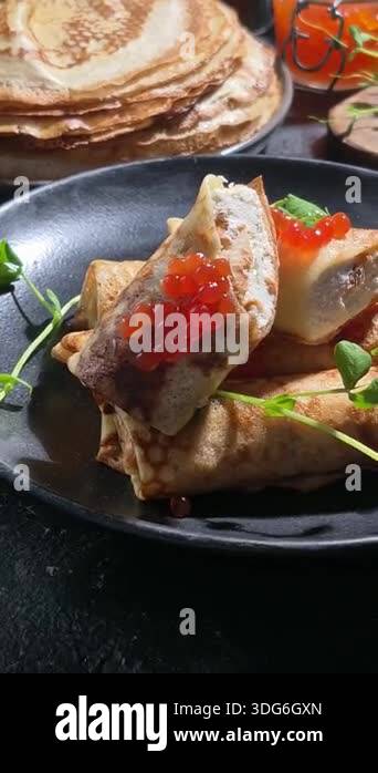 Traditional blini with cream cheese and red caviar.Maslenitsa Stock ...
