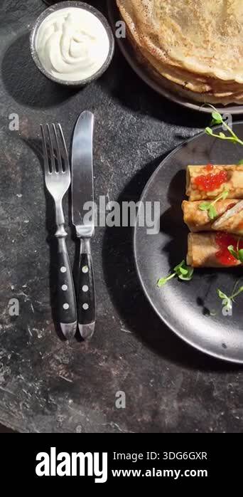 Traditional blini with cream cheese and red caviar.Maslenitsa Stock ...