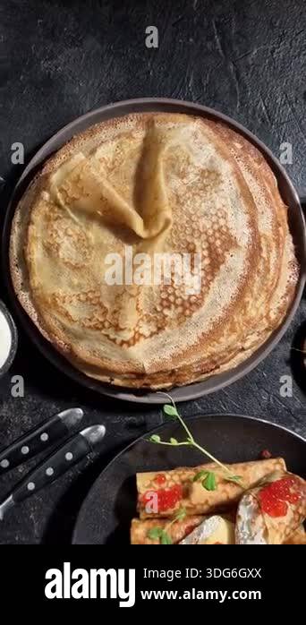 Traditional blini with cream cheese and red caviar.Maslenitsa Stock ...