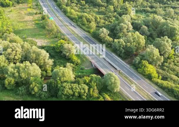 Beautiful aerial view of road infrastructure in nature Stock Video ...