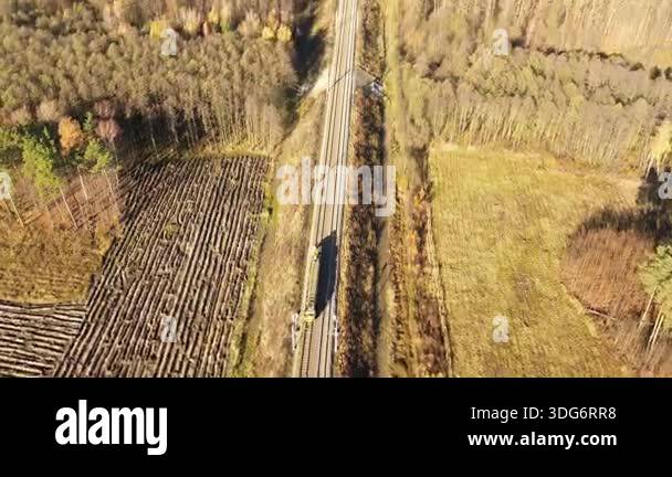 Scenic European forest path with electric railway Stock Video Footage ...