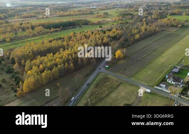 Green countryside divided by paved road Stock Video Footage - Alamy