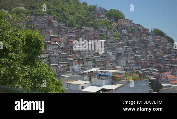 Panoramic view of hillside homes surrounded by vegetation, combining ...