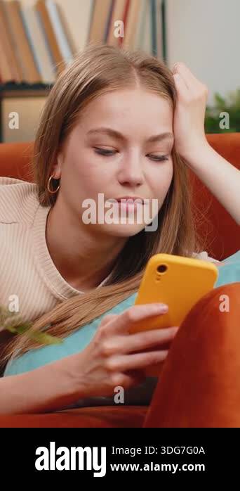 Happy woman use mobile smartphone typing browsing say Wow yes found out ...