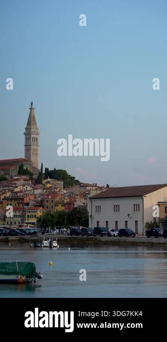 Rovinj, Croatia - August 16, 2025: A tall, historic bell tower rises ...