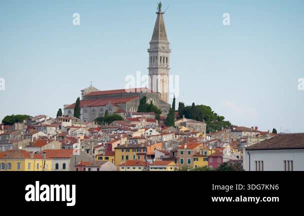 Rovinj, Croatia - August 16, 2025: The tall, historic bell tower of St ...