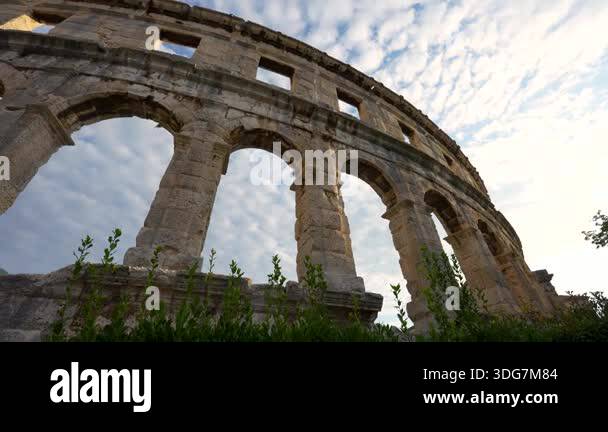 Pula, Croatia - August 18, 2025: The Pula Arena stands as a monumental ...