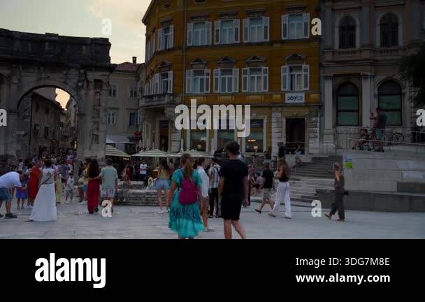 Pula, Croatia - August 17, 2025: The Arch of the Sergii stands as a ...