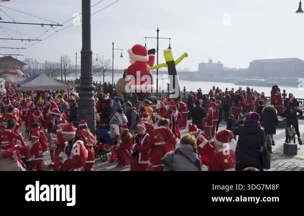 Budapest, Hungary - December 7, 2025: A dense crowd of people in Santa ...