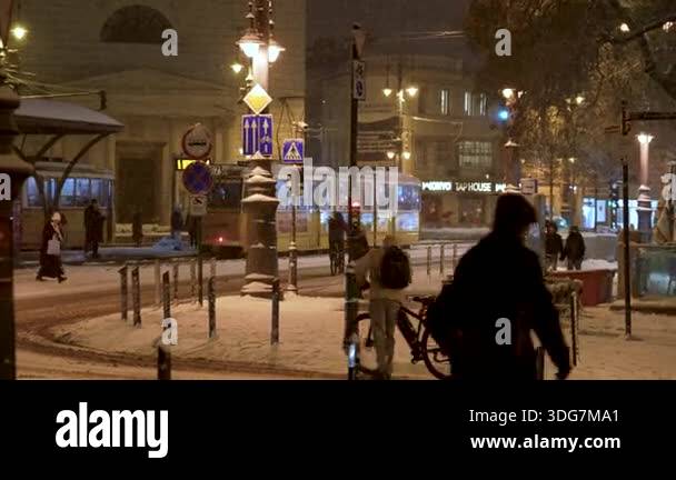 Budapest, Hungary - January 6, 2026: A yellow tram moves through a ...