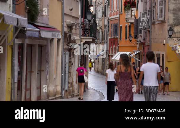 Rovinj, Croatia - August 16, 2025: Warm sunset light filters through a ...