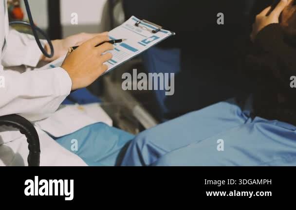 Physical therapist doctor teach senior man patient using dumbbell ...