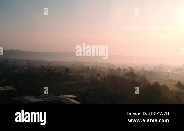 Soft Sunrise Light Over Misty Rural Landscape Stock Video Footage - Alamy