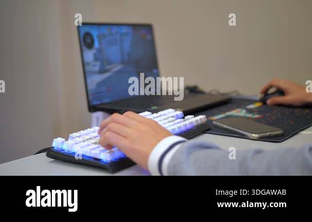 Gamer Hands On Illuminated Keyboard Typing And Clicking Mouse During ...