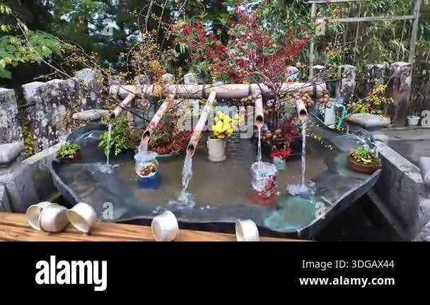 Traditional Water Purification Ritual Fountain at Japanese Shrine. High ...