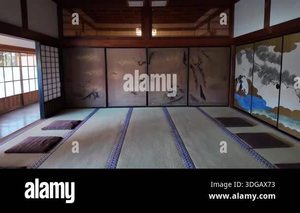 Traditional Japanese tatami room with sliding doors and painted panels ...