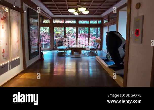 Traditional Japanese tatami room with sliding doors and painted panels ...