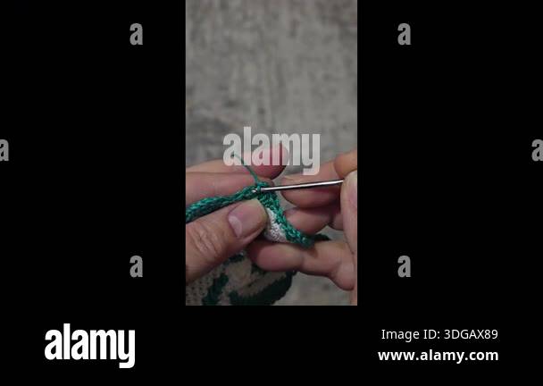 Handcrafted colorful candy-shaped potholders on a wooden background ...