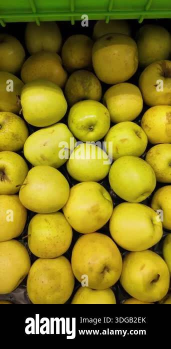 Hand wearing plastic glove picking an apple in supermarket Stock Video ...