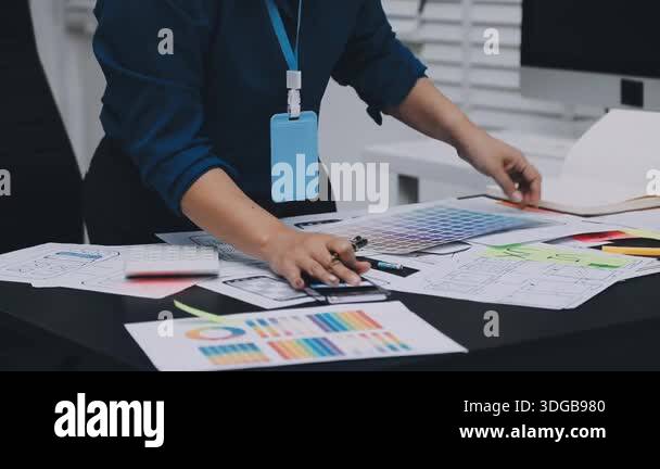 UI designer and UX developer brainstorm idea to design the application ...