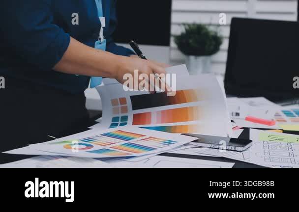 UI designer and UX developer brainstorm idea to design the application ...