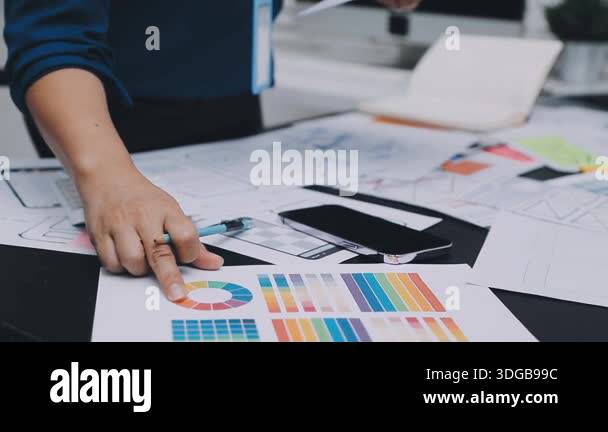 UI designer and UX developer brainstorm idea to design the application ...