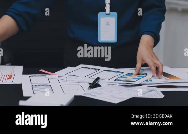 UI designer and UX developer brainstorm idea to design the application ...