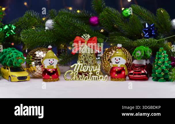 On a blue background with flashing lights in front of decorated ...