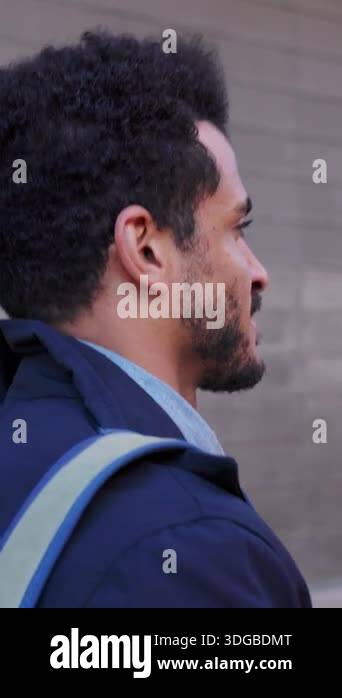 Side view of a confident young successful businessman with a beard and ...