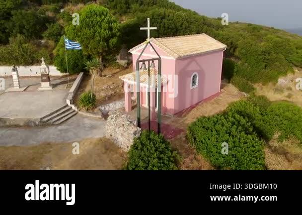 Aerial Drone View of Secluded Pink Greek Orthodox Chapel with Bell ...