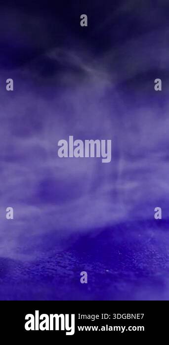 Vertical video. Cloud art. Paint flow. Defocused blue neon color fog ...