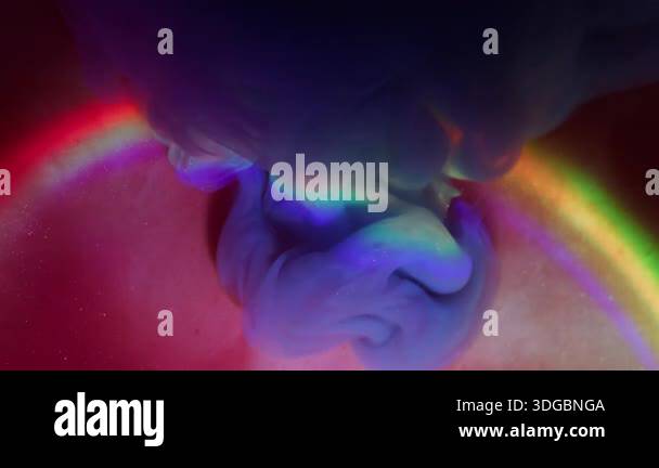 Paint spill. Shiny fluid. Red blue sparkling blob spreading on black ...