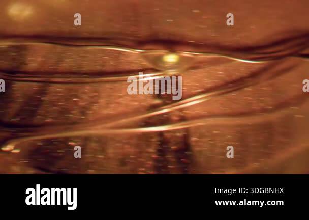 Shimmer texture. Visual light. Defocused golden yellow orange color ...