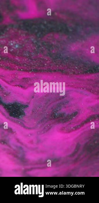 Vertical video. Marble ink texture. Glitter fluid spill. Defocused neon ...